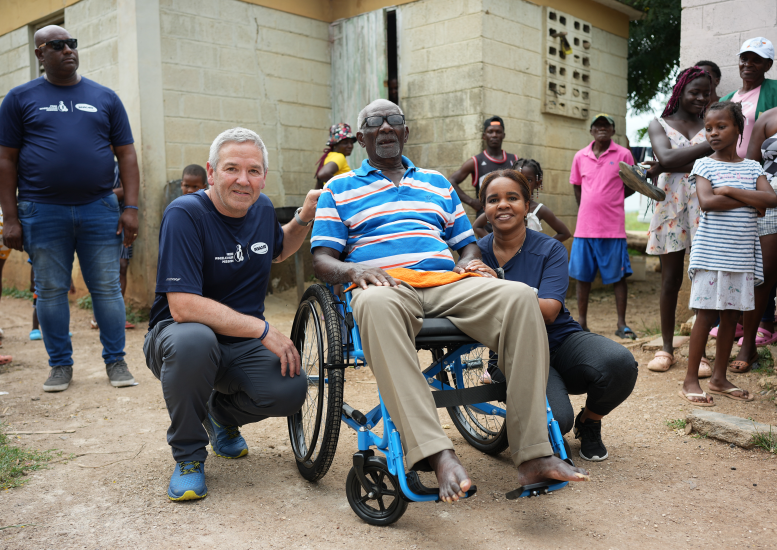 CEO Geoff Purtill distributes wheelchairs following our Move for ...